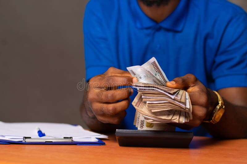 Nigerian Black Man Counting Some Money Stock Image - Image of africa ...