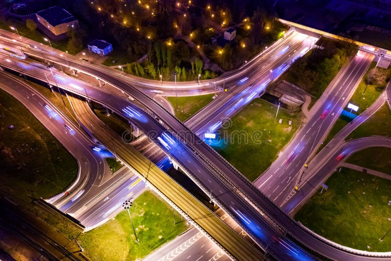 Night Aerial View of a Freeway Intersection Traffic Trails in Night ...