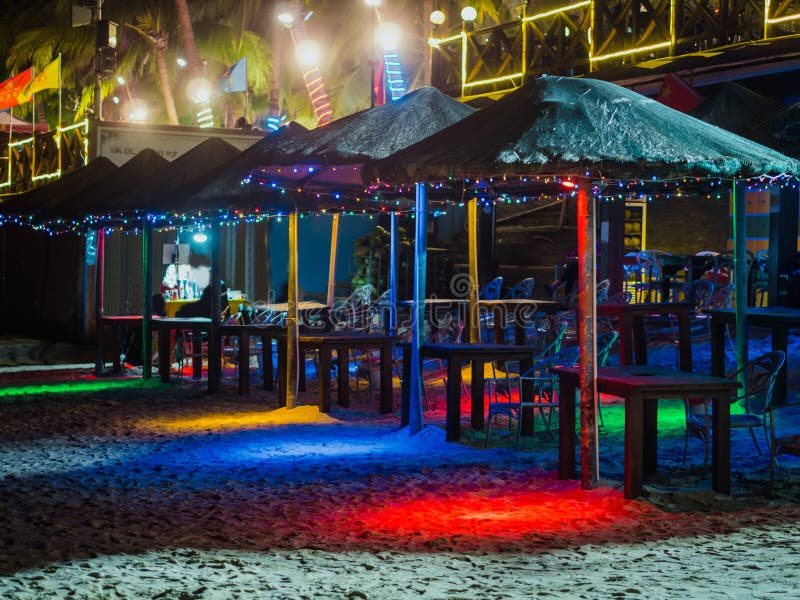 Night beach with cafe stock image. Image of road, night - 175528675