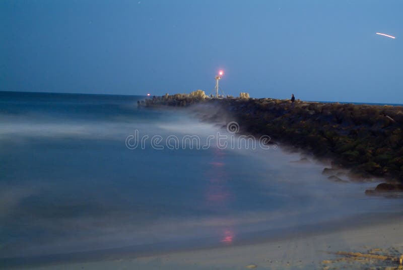 Night beach scene stock photo. Image of beach, rocks, jetty - 6343298