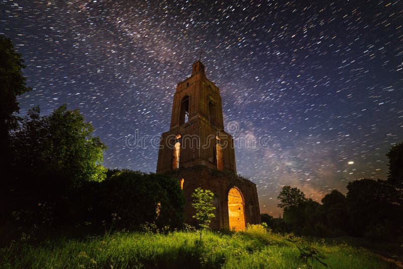 Night Bell Tower Ruin in Forest at Starry Night with Internal Light ...