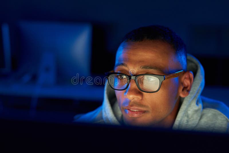 Night Black Man Or Hacker Reading On Laptop For Cybercrime Malware Or Phishing For Stealing