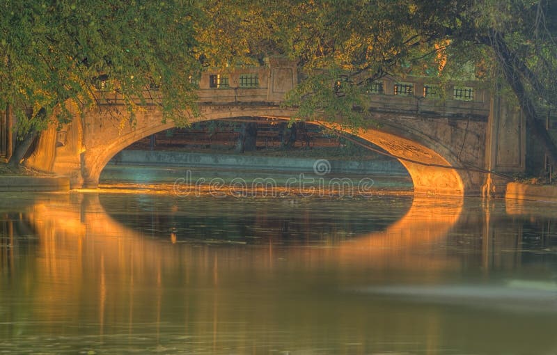Night bridge in a park stock photo. Image of arch, bucharest - 7051696
