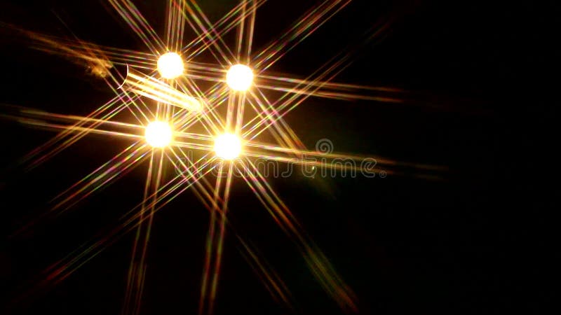 Night Bright Lights with Rays Revolve Around the Circle Against the ...