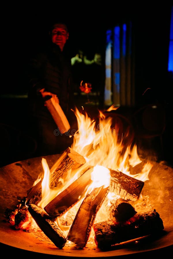 Night Burning Bonfire Metal Stand Man Throws Stock Photo - Image of ...
