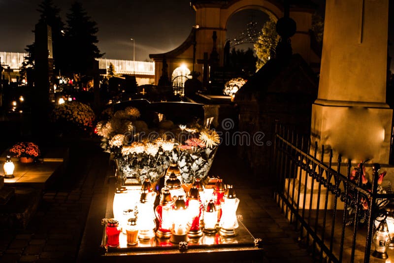 Night Cemetery. Burning Candles in the Cemetery at Night. Background ...