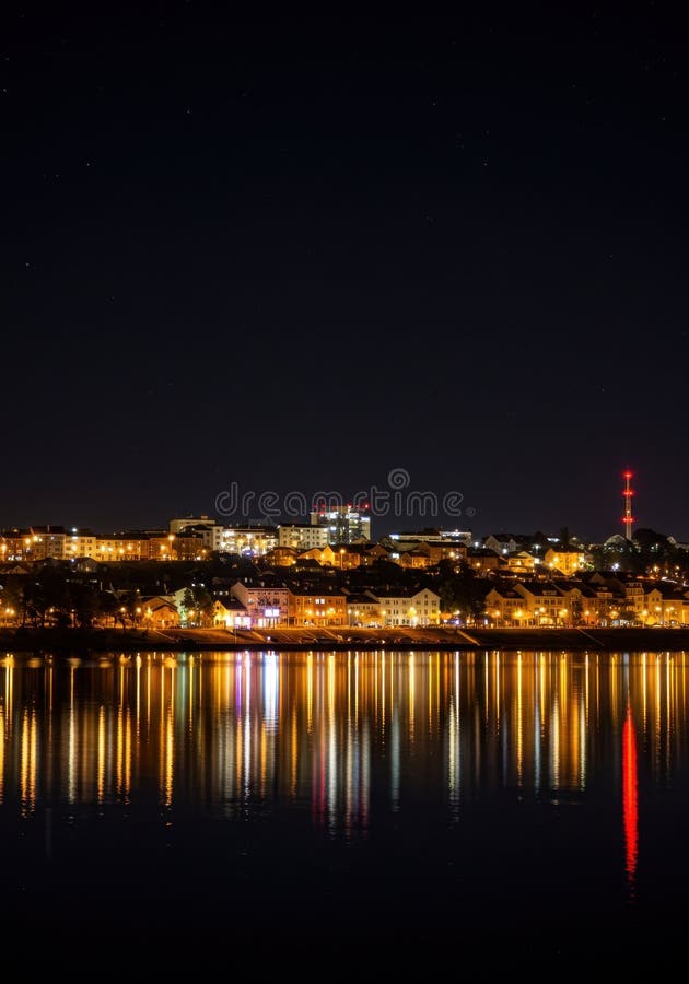 Night City Lights Reflecting on Calm Water Stock Photo - Image of ...