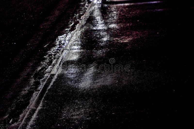 Night City with the Reflection of Lights on a Road Stock Image - Image ...