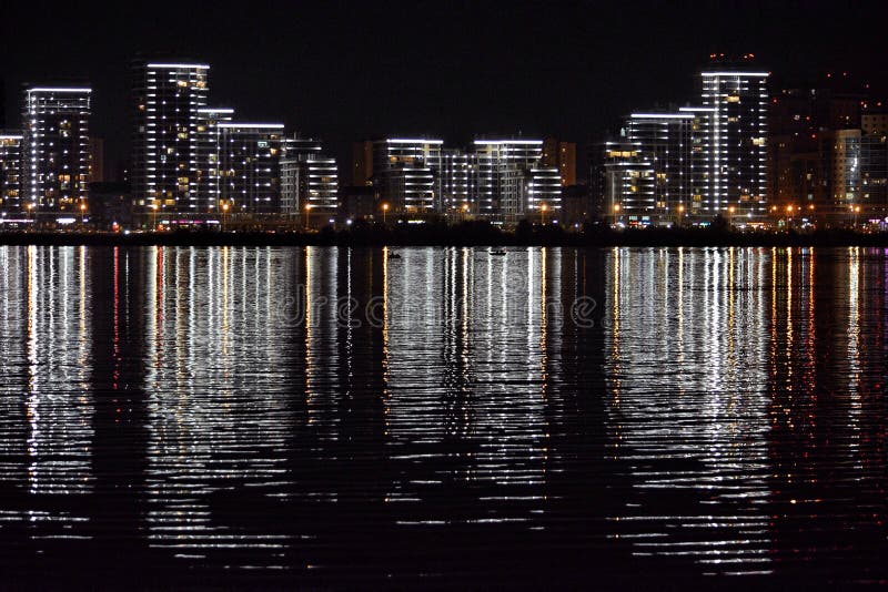 Night city. Reflection stock image. Image of light, nightscape - 104064313
