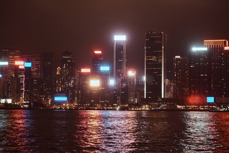 Night City with Scyscrapers, Colourful Led Lights and Reflection in ...