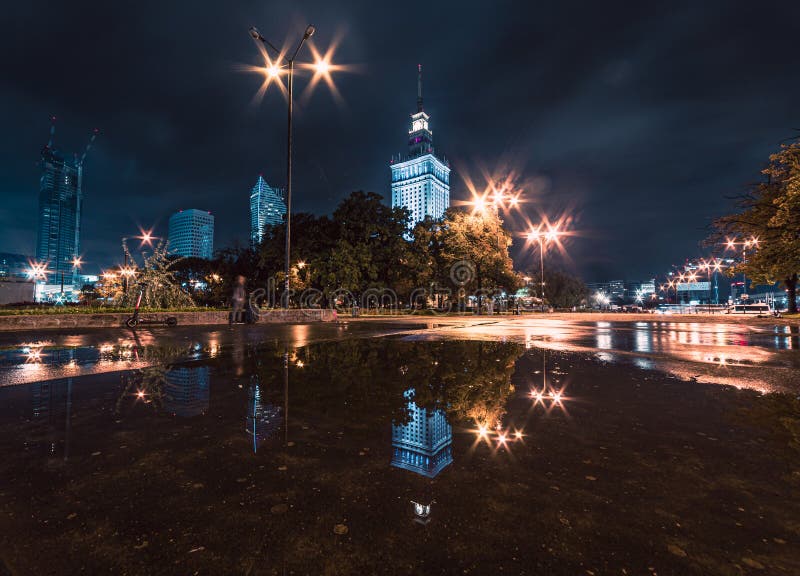 Night Cityscape with Reflections in the Puddle Stock Photo - Image of ...