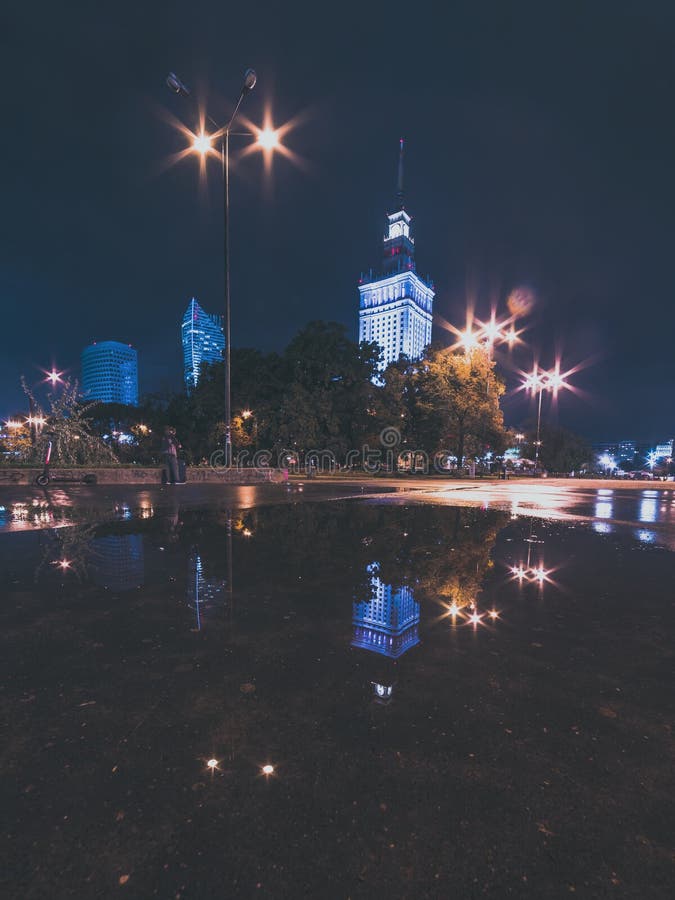 Night Cityscape with Reflections in the Puddle Stock Photo - Image of ...