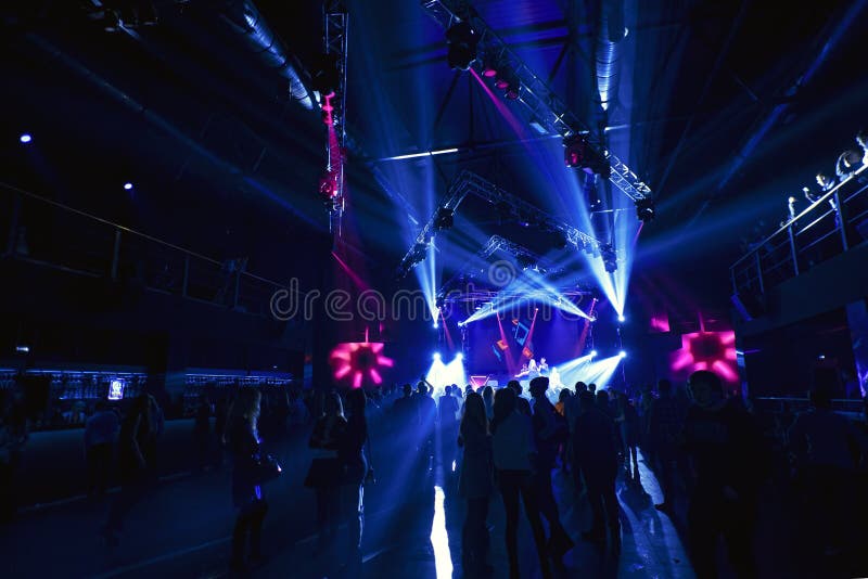 Night Club Silhouette Crowd in Front of Bright Stage Lights Editorial ...