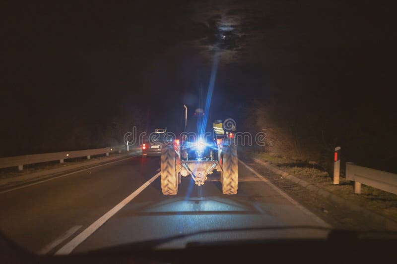 Night Driving Behind a Tractor Stock Photo - Image of markings ...