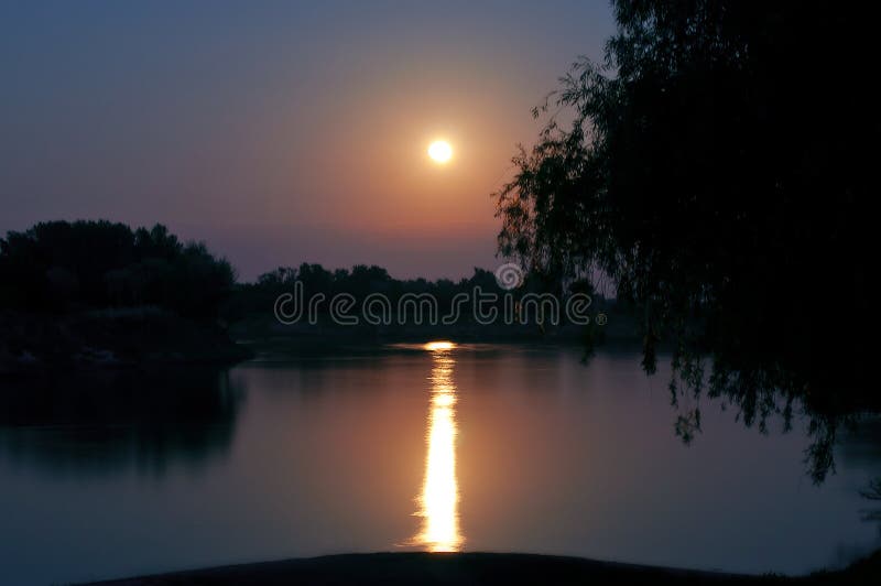Night Landscape with a Full Moon Over the Lake, Which Reflects the ...