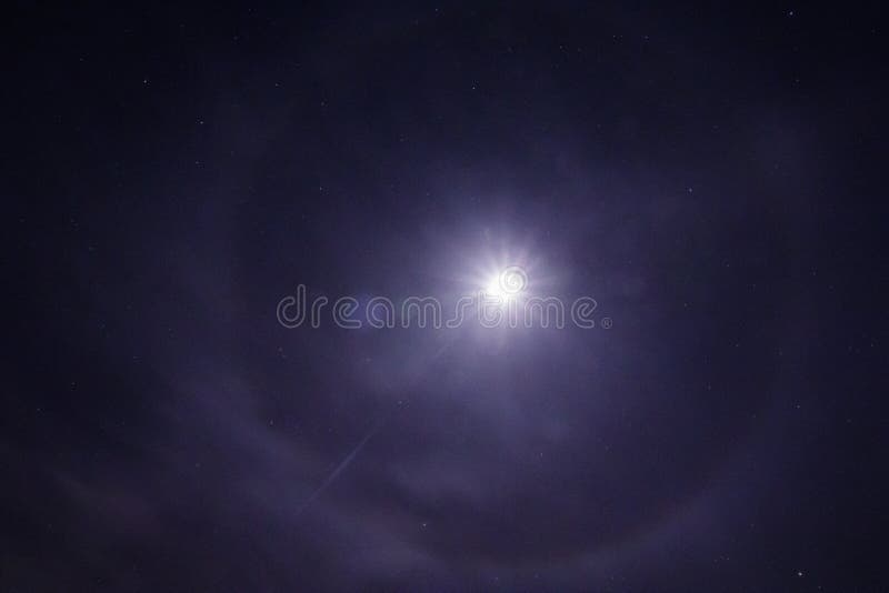 Night Landscape in Long Exposure with Moon Halo Vision with Stars Stock ...