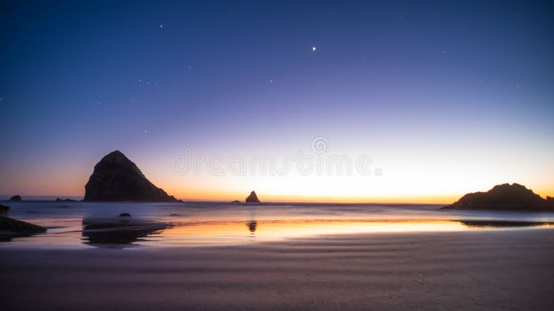 Night Landscape on the Pacific Ocean, Cannon Beach. Stars and Cliffs ...