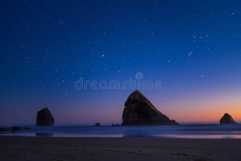 Night Landscape on the Pacific Ocean, Cannon Beach. Stars and Cliffs ...