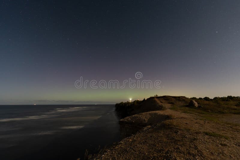 Night Landscape Starry Sky Lighthouse Cliff Calm Sea Stock Photos ...