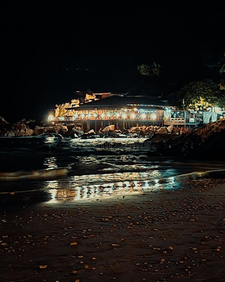 Night Light of the Resort with Reflections on the Beach Sand Stock ...
