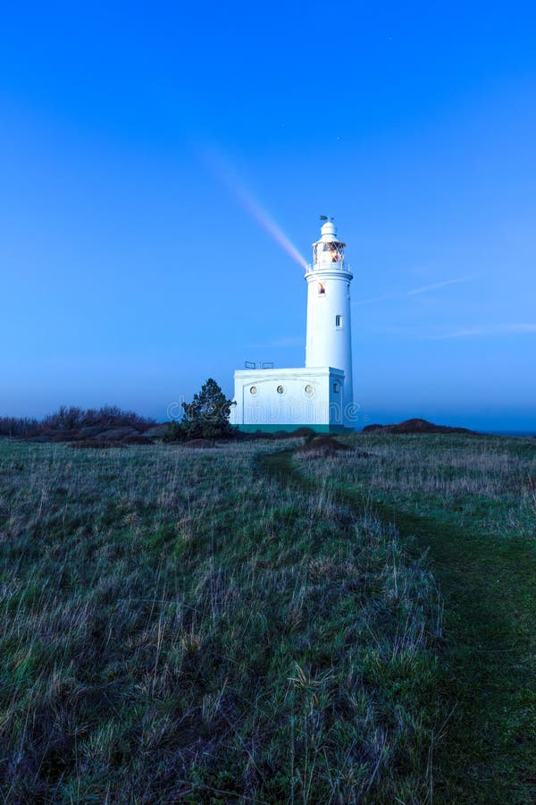 A Night Long Exposure View of the Hurst Point Lighthouse with Rainbow ...