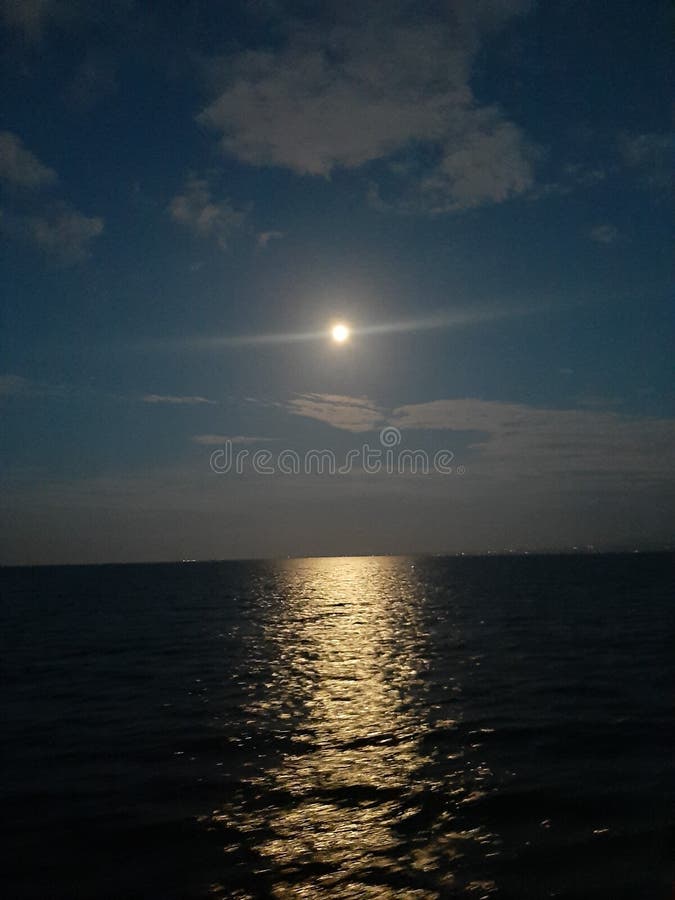 Moonlight in Ocean Landscape. Bright Full Moon Over the Sea Stock Photo ...