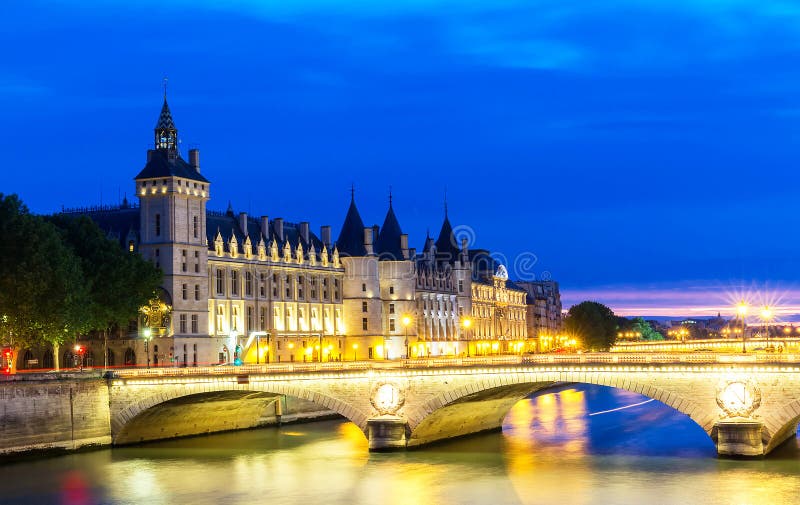 The Night in Paris, Change Bridge and Conciergerie, Paris. Stock Photo ...