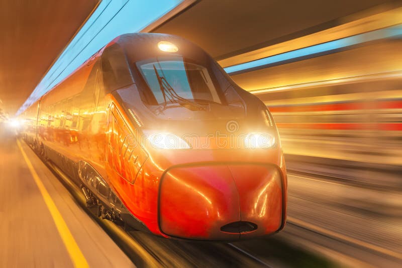 Night Passenger High-speed Train Passing the Station in the City Stock ...