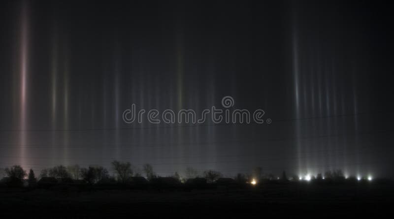 Night Photo of the Village, Light Rays from Searchlights in the Cold ...