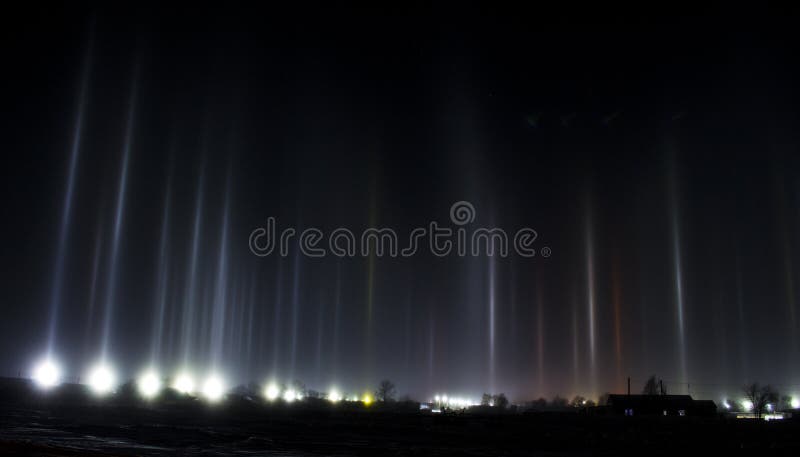 Night Photo of the Village, Light Rays from Searchlights in the Cold ...