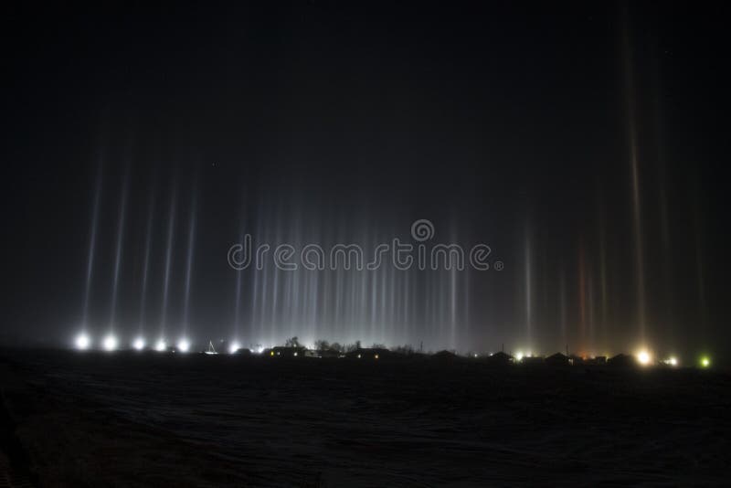 Night Photo of the Village, Light Rays from Searchlights in the Cold ...