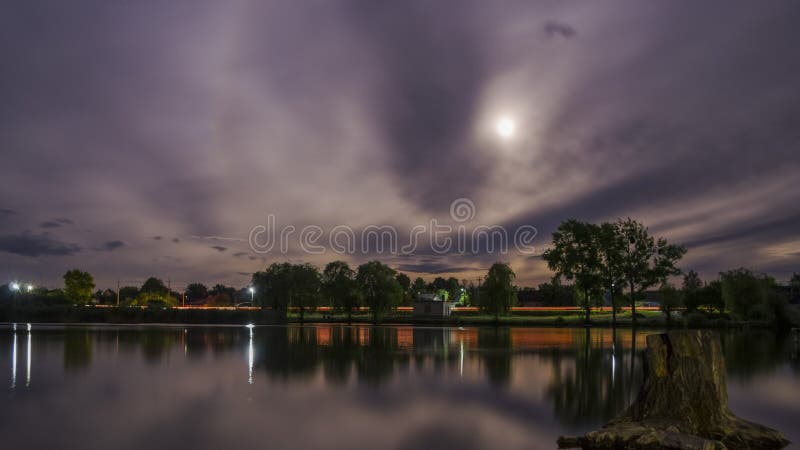 Night on the pond stock photo. Image of stake, clouds - 96642196