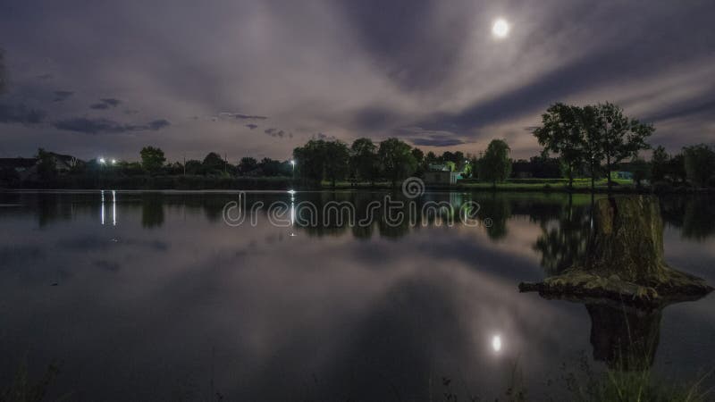 Night on the pond stock photo. Image of clouds, trees - 96642222