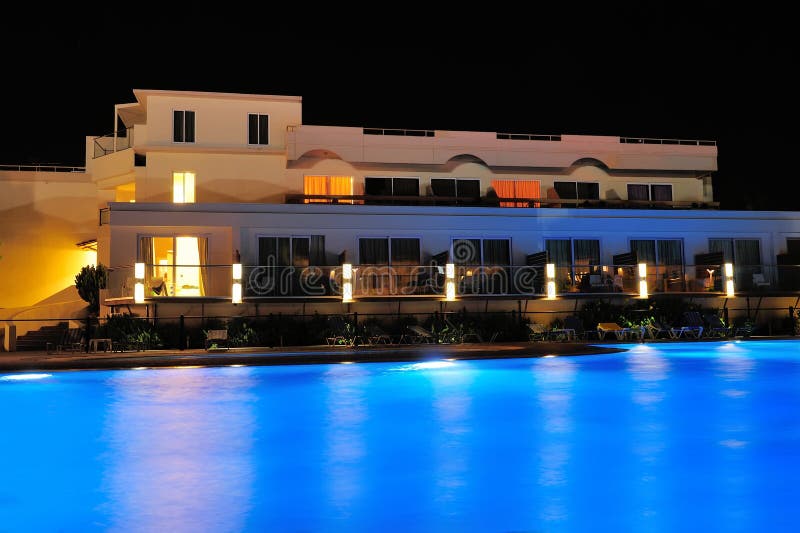 Night pool side of hotel stock image. Image of lobby - 31815701