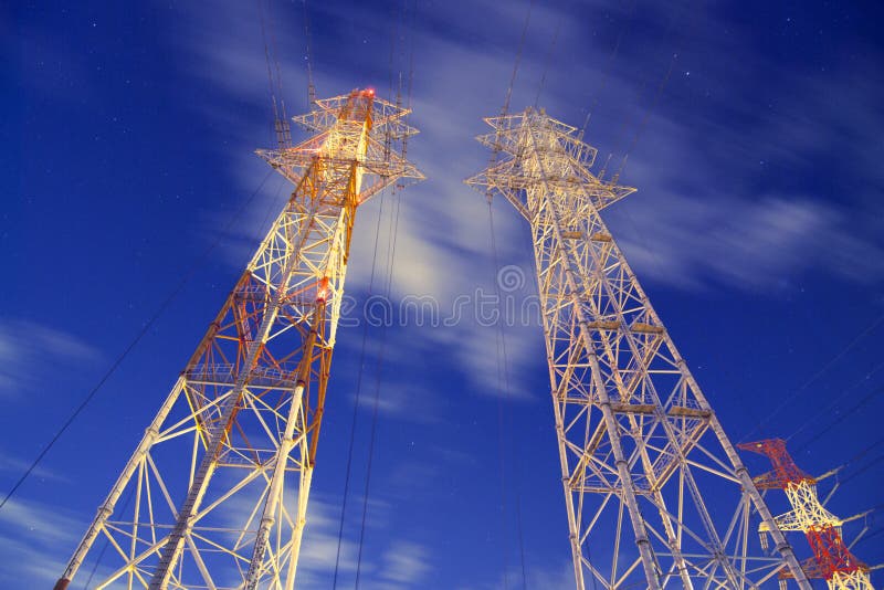 Night pylons stock image. Image of electricity, abstract - 26264243