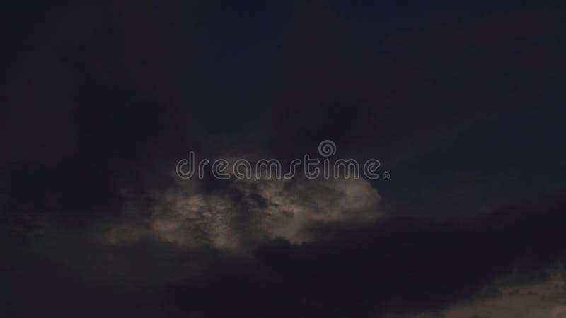 Night Rain in the City with Illuminated 24/7 Sign on a Dark and Cloudy ...