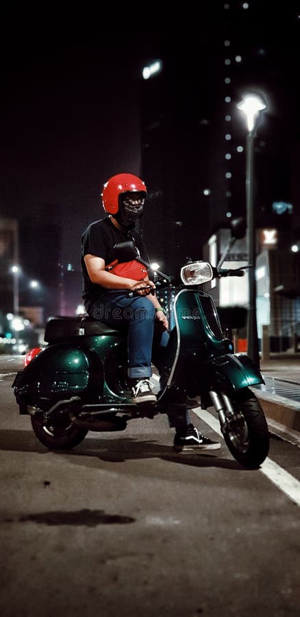 Man riding a red Vespa editorial stock image. Image of motorbike ...