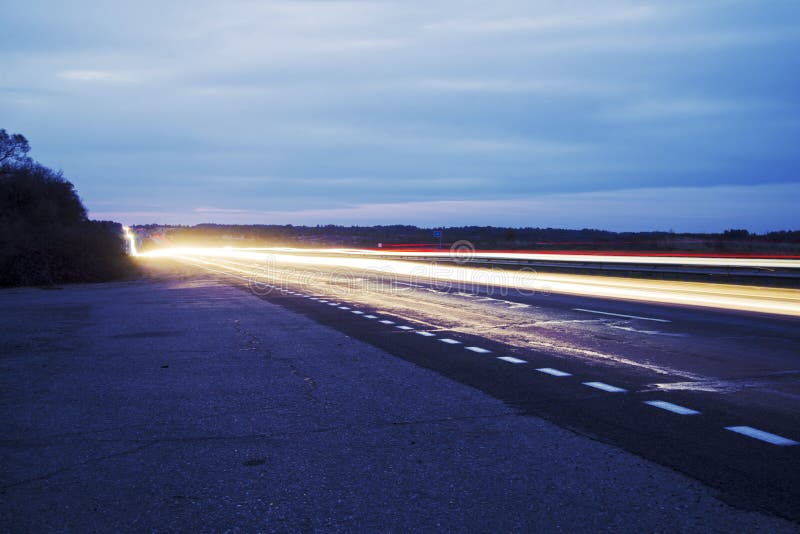 Night Road and Light from the Headlights Outside the City Stock Image ...