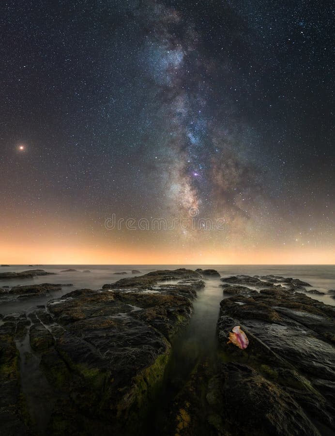 Night on the rocks stock photo. Image of nebula, ocean - 145314386