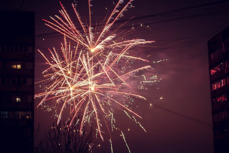 Night Salute. Explosion Lines of Different Colors. Outbreaks between ...