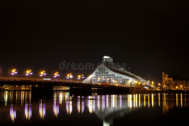 Night Scene of the Bridge and the National Library of Riga Stock Photo ...