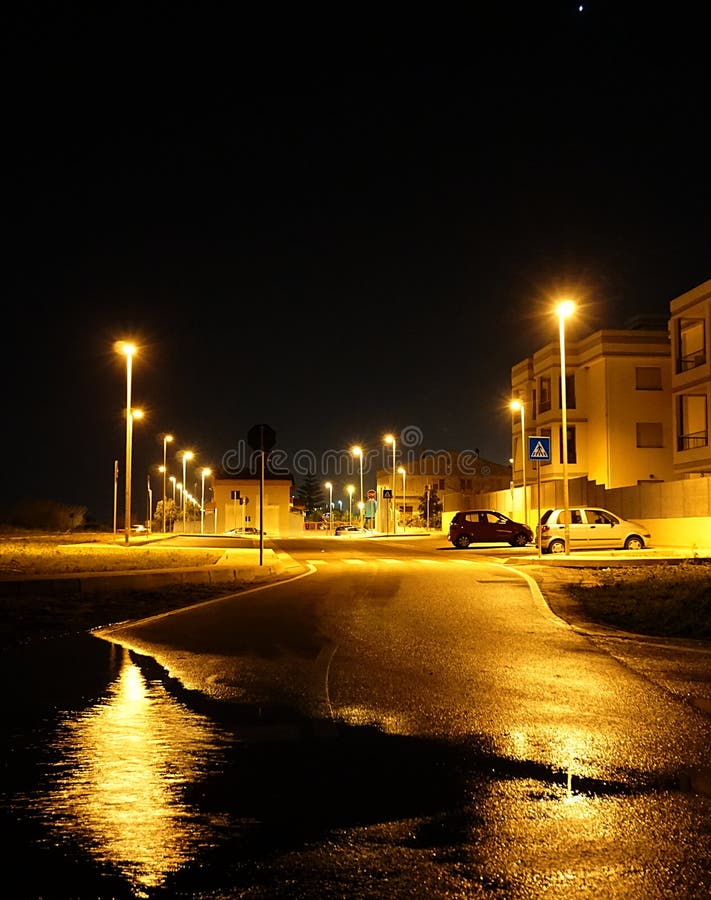 Night scene stock image. Image of road, puddle, night - 85582989