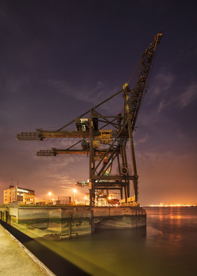 Night Scene with Gigantic Crane on Illuminated Container Terminal Stock ...