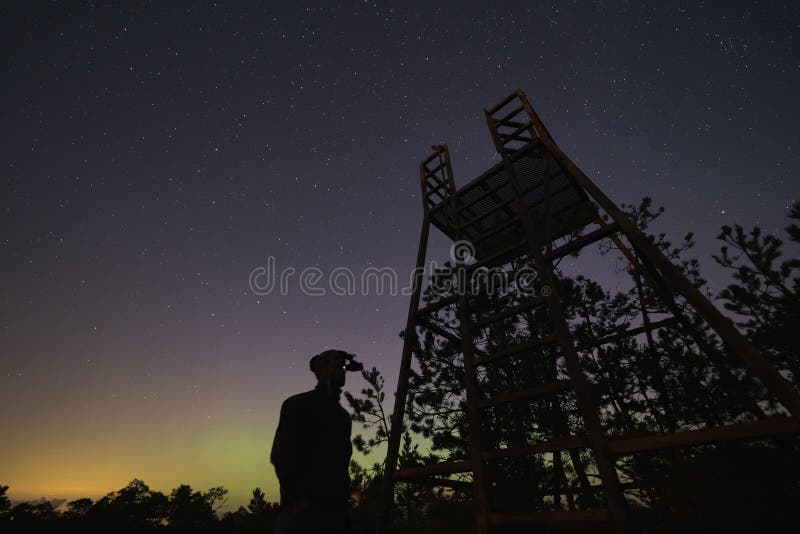 Night Scene, a Man with a Night Vision Device Stands Near an ...