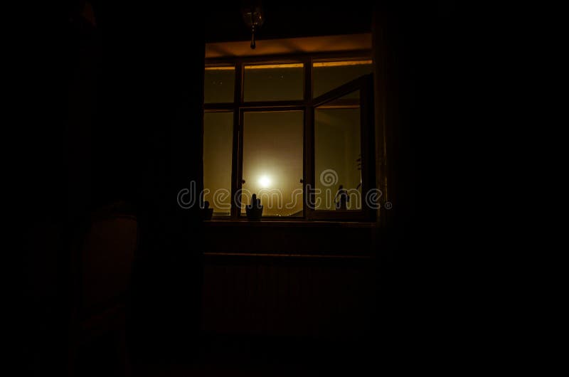 Night Scene of Moon Seen through the Window from Dark Room. Stock Photo ...