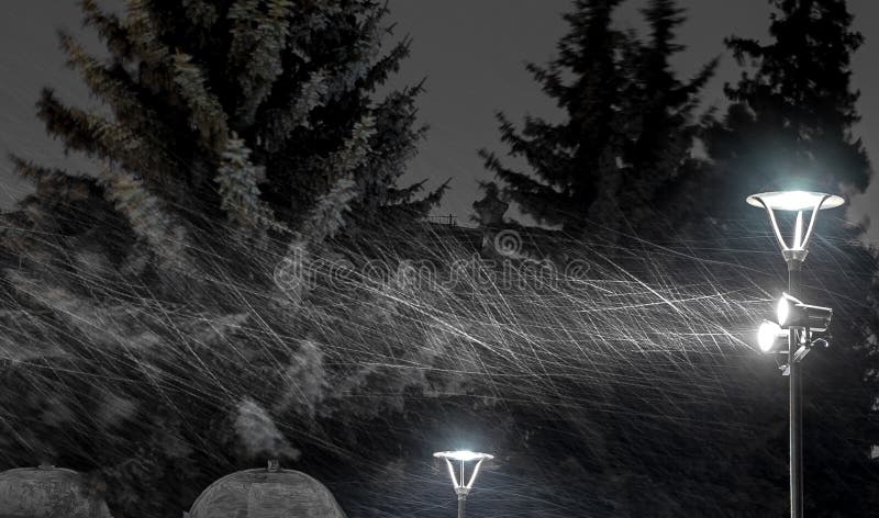 Night Scene - Snow in the Light of Street Lantern - Wind Stock Photo ...
