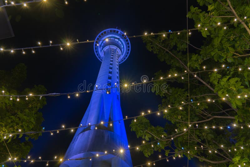 Night Scene Tall Circular Tower Illuminated Blue Viewed through Strings ...