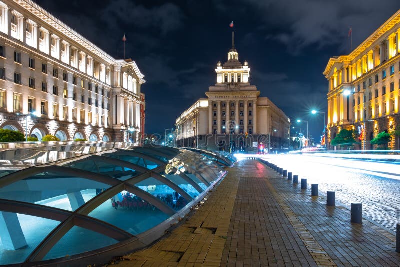 Night Scene of Tram in Traffic at Crossing with Lighttrail Motion Blur ...