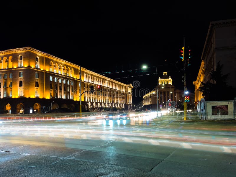 Night Scene of Tram in Traffic at Crossing with Lighttrail Motion Blur ...