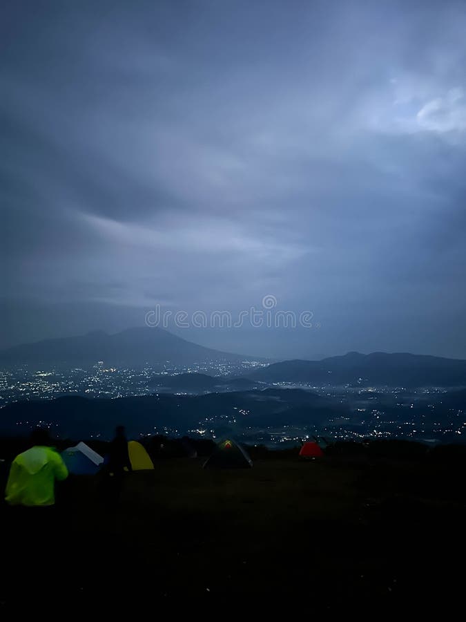 Night Scenery of Camping at Puncak Peyeum in West Java with Illuminated ...